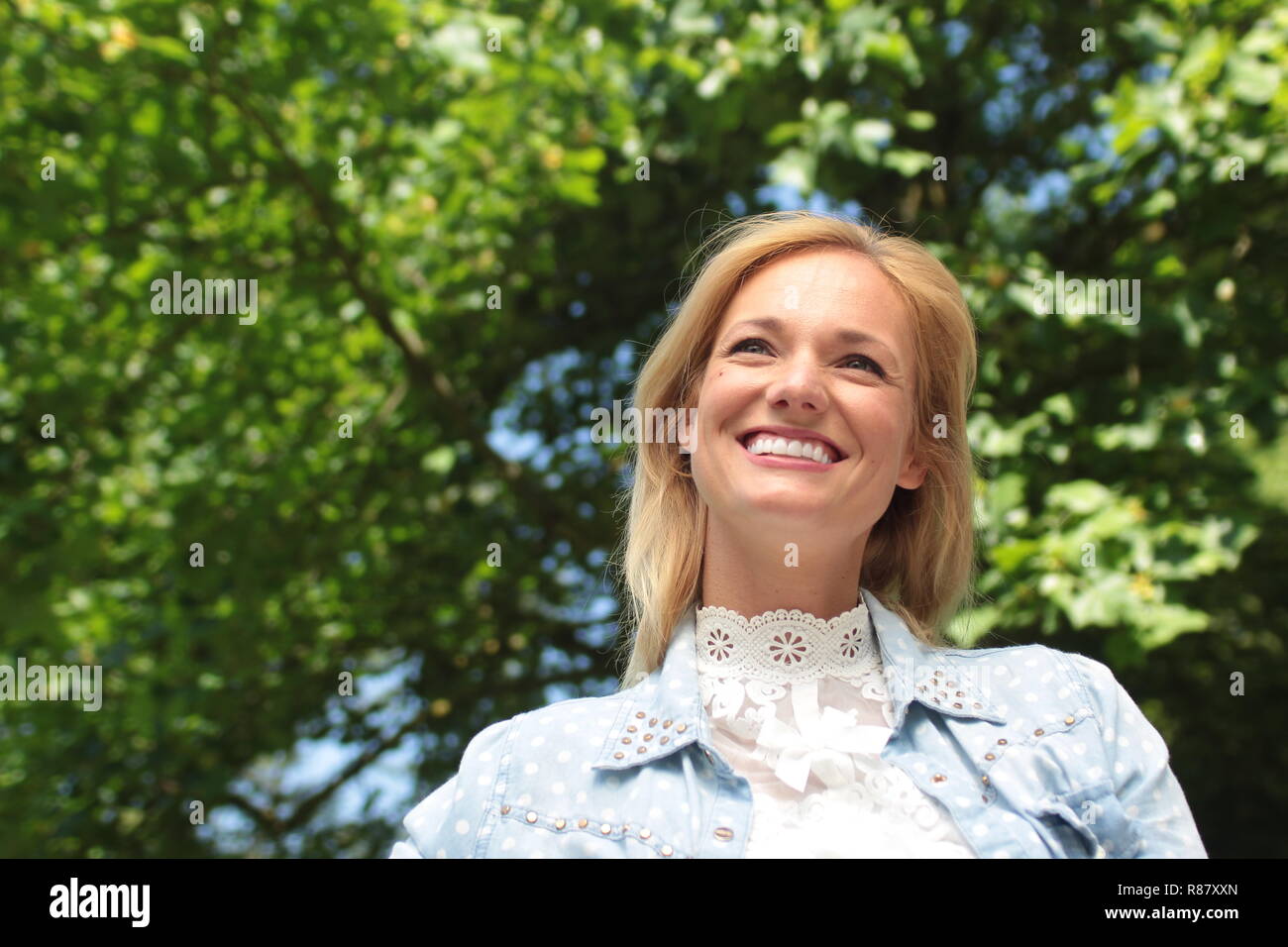 Beautiful woman outside Stock Photo - Alamy