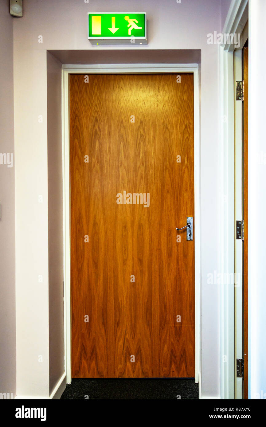 Exit Opened Door With Sign Exit Above