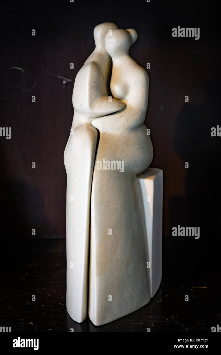 A Contemporary Ceramic Sculpture of a male and female couple embracing ...