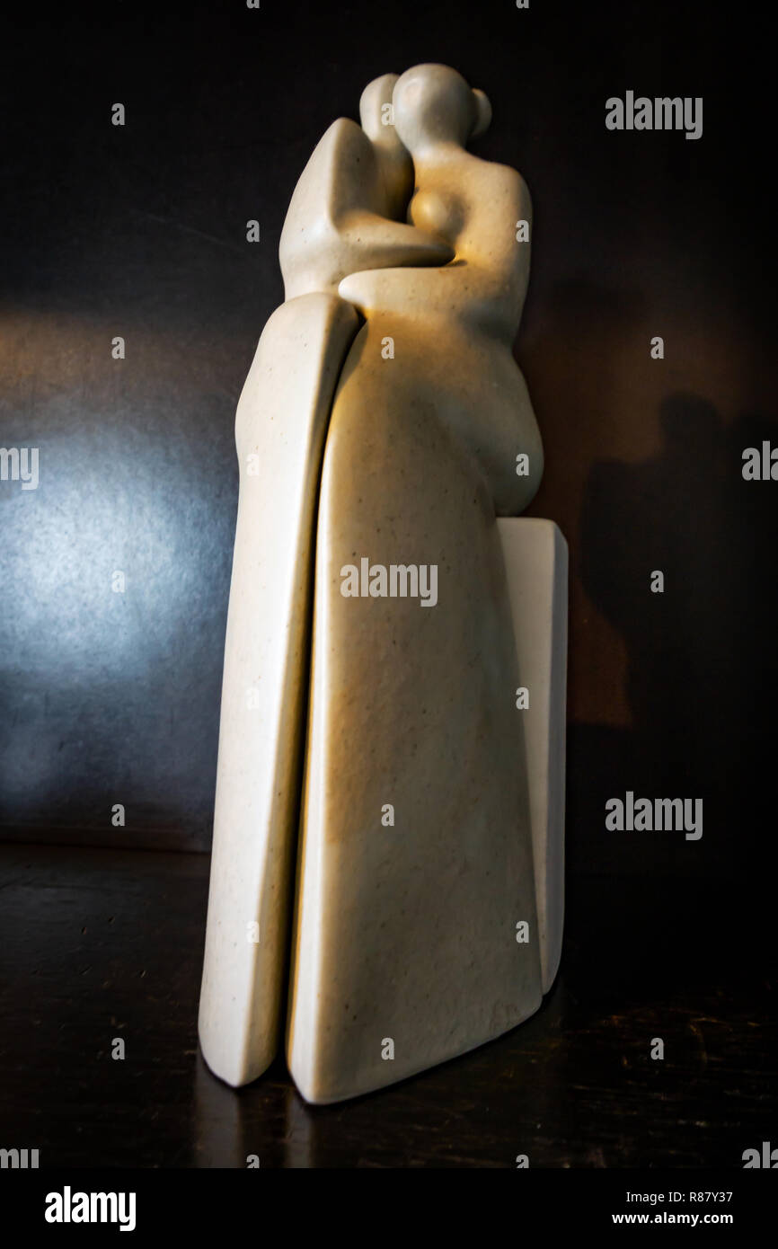 A Contemporary Ceramic Sculpture of a male and female couple embracing ...