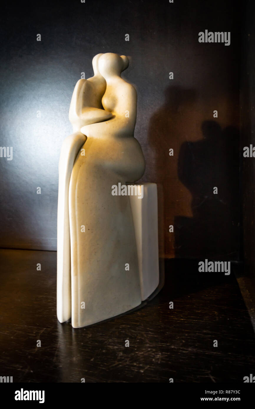 A Contemporary Ceramic Sculpture of a male and female couple embracing ...