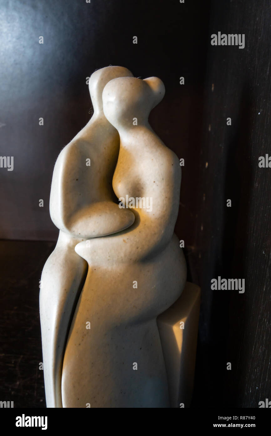 A Contemporary Ceramic Sculpture of a male and female couple embracing ...