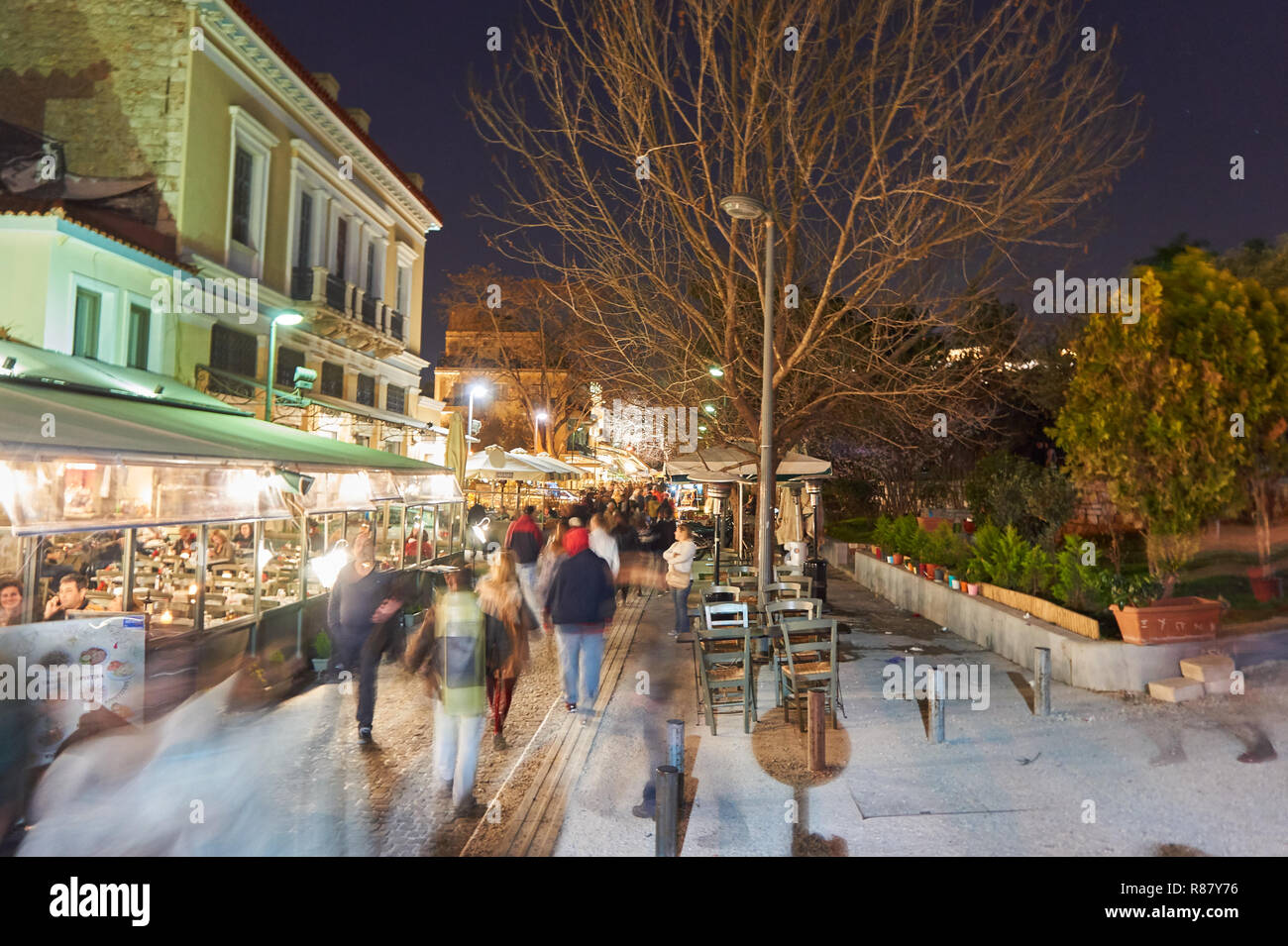 Night walk on the pedestrians streets of Thissio in Athens, Greece ...