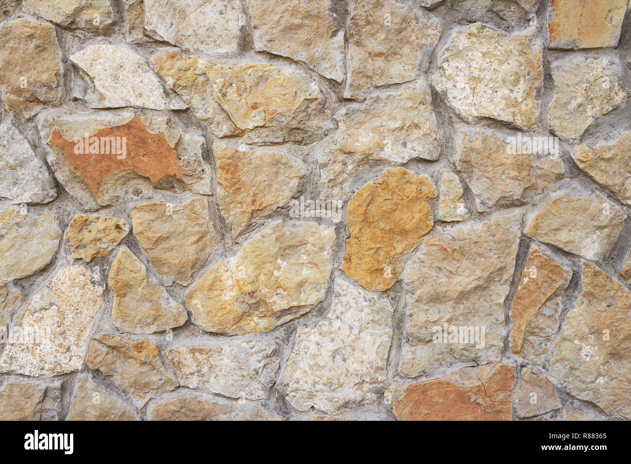 Stone wall texture. Ancient natural cobblestone road as background ...