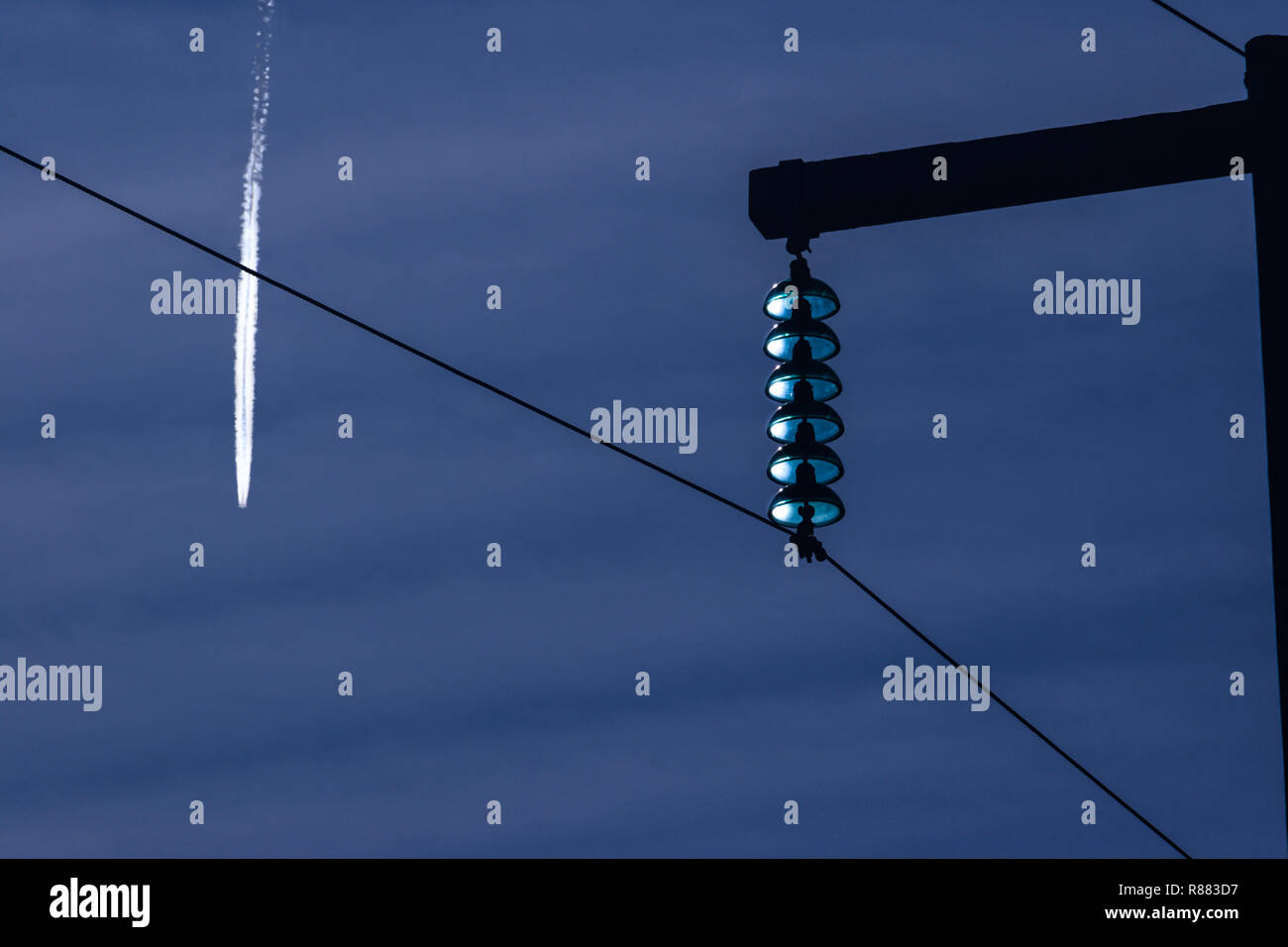 115 Kv High tension power lines supported high above the ground using ...