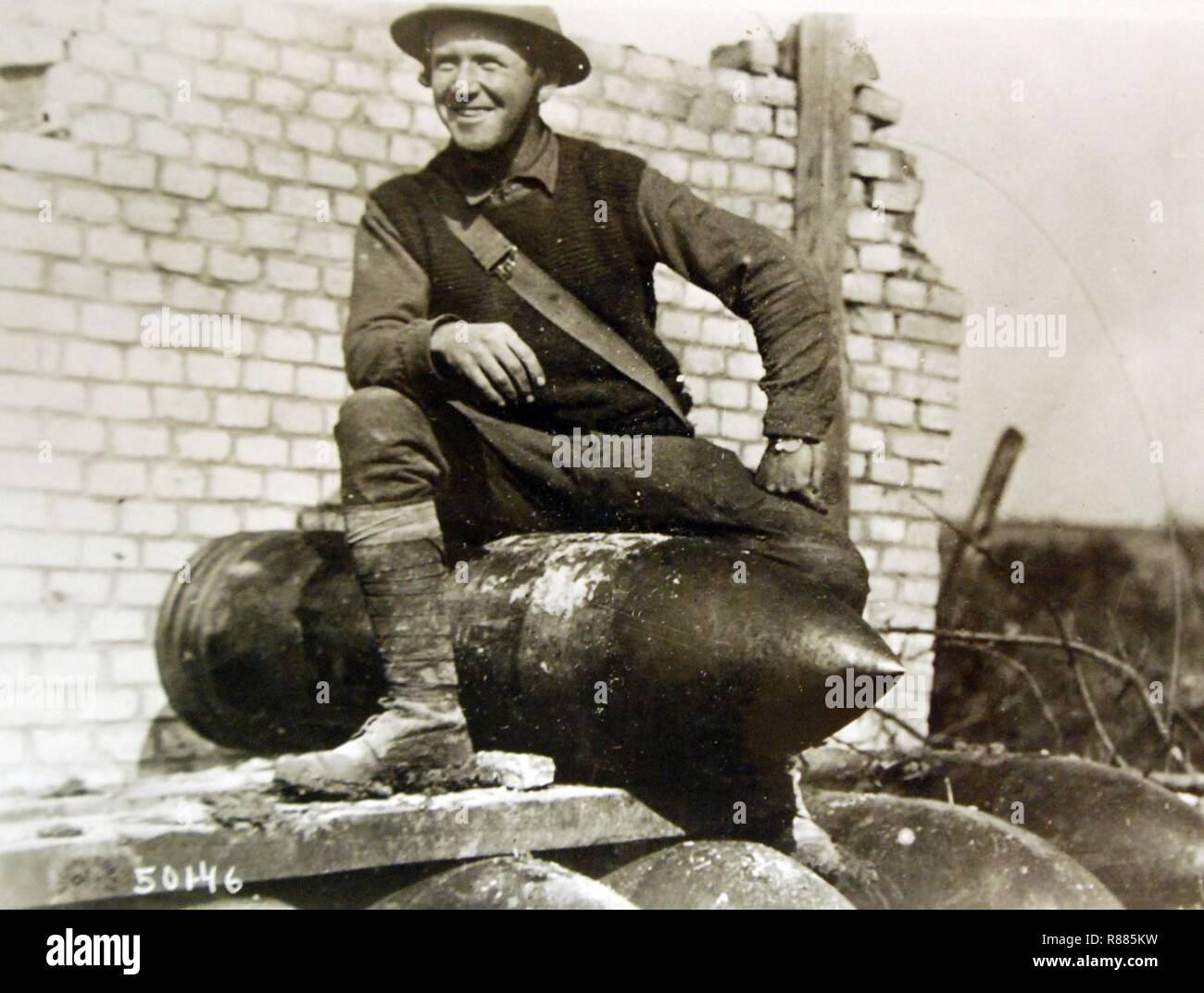 Captured 38 cm shells compared to a man, 106th Regiment Field Artillery ...