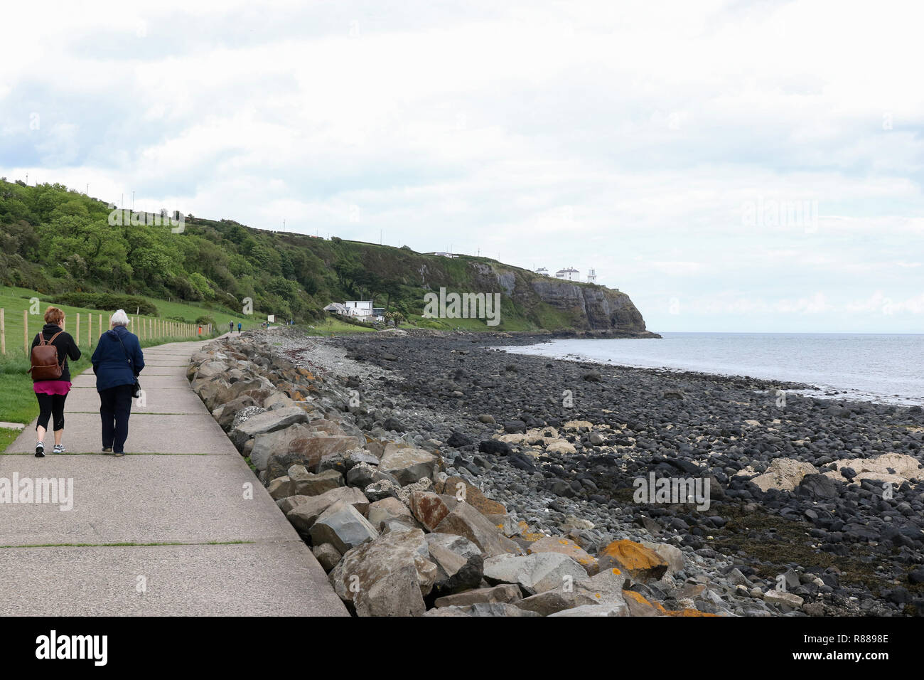 Blackhead coastal path and Black Head lighthouse on Belfast Lough Stock ...