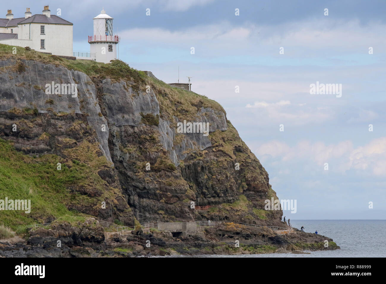 Blackhead coastal path and Black Head lighthouse on Belfast Lough Stock ...