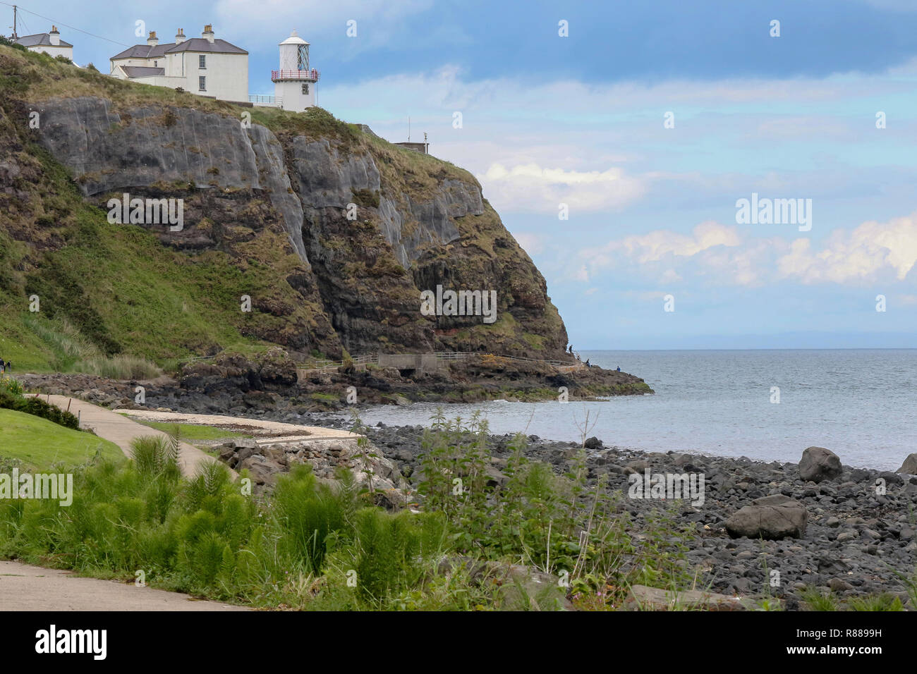 Blackhead coastal path and Black Head lighthouse on Belfast Lough Stock ...