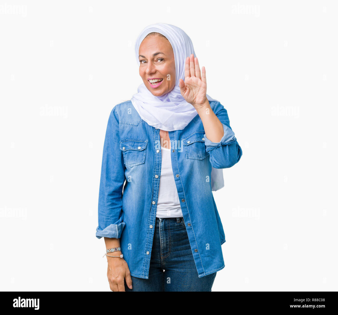 Middle age eastern arab woman wearing arabian hijab over isolated ...
