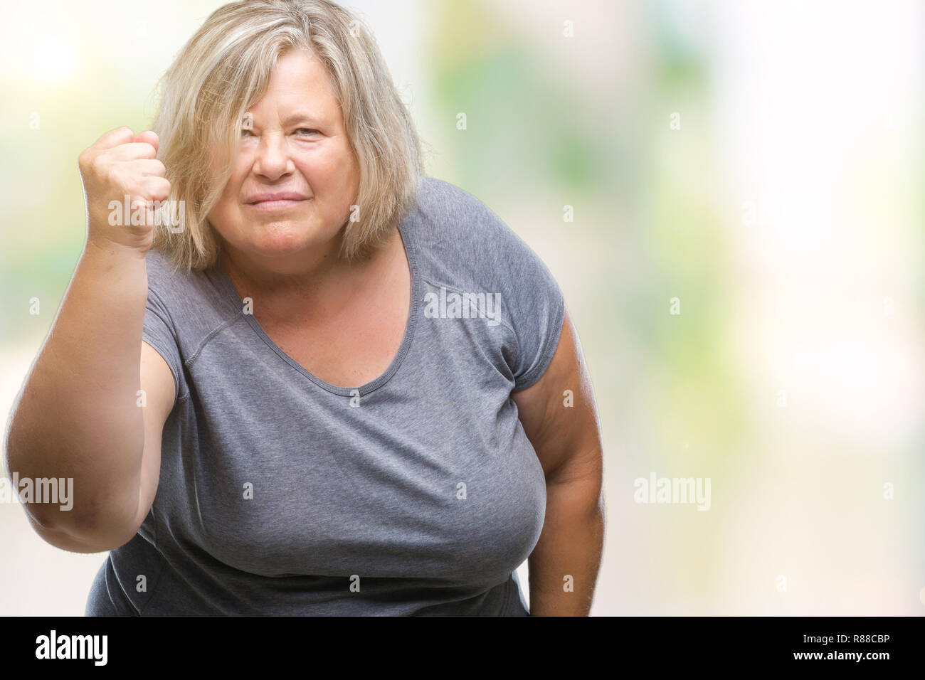 Senior plus size caucasian woman over isolated background angry and mad ...