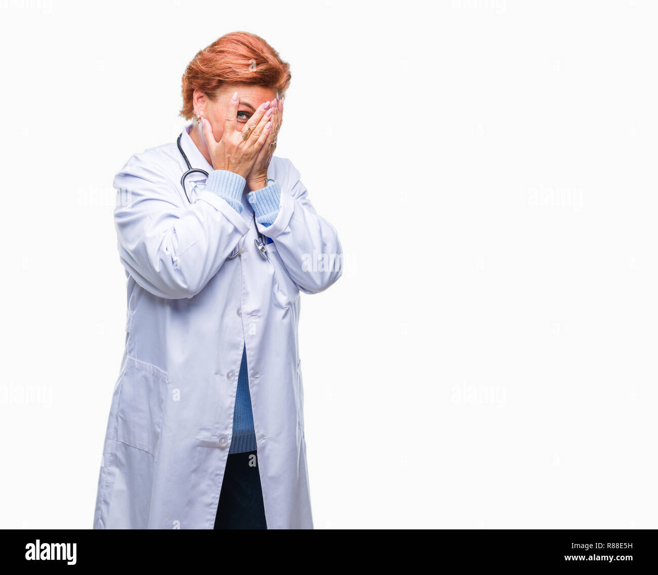 Senior caucasian doctor woman wearing medical uniform over isolated ...