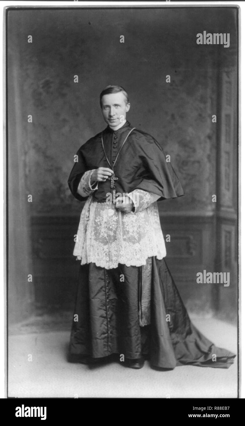 Cardinal James Gibbons, full-length portrait, standing, facing left ...