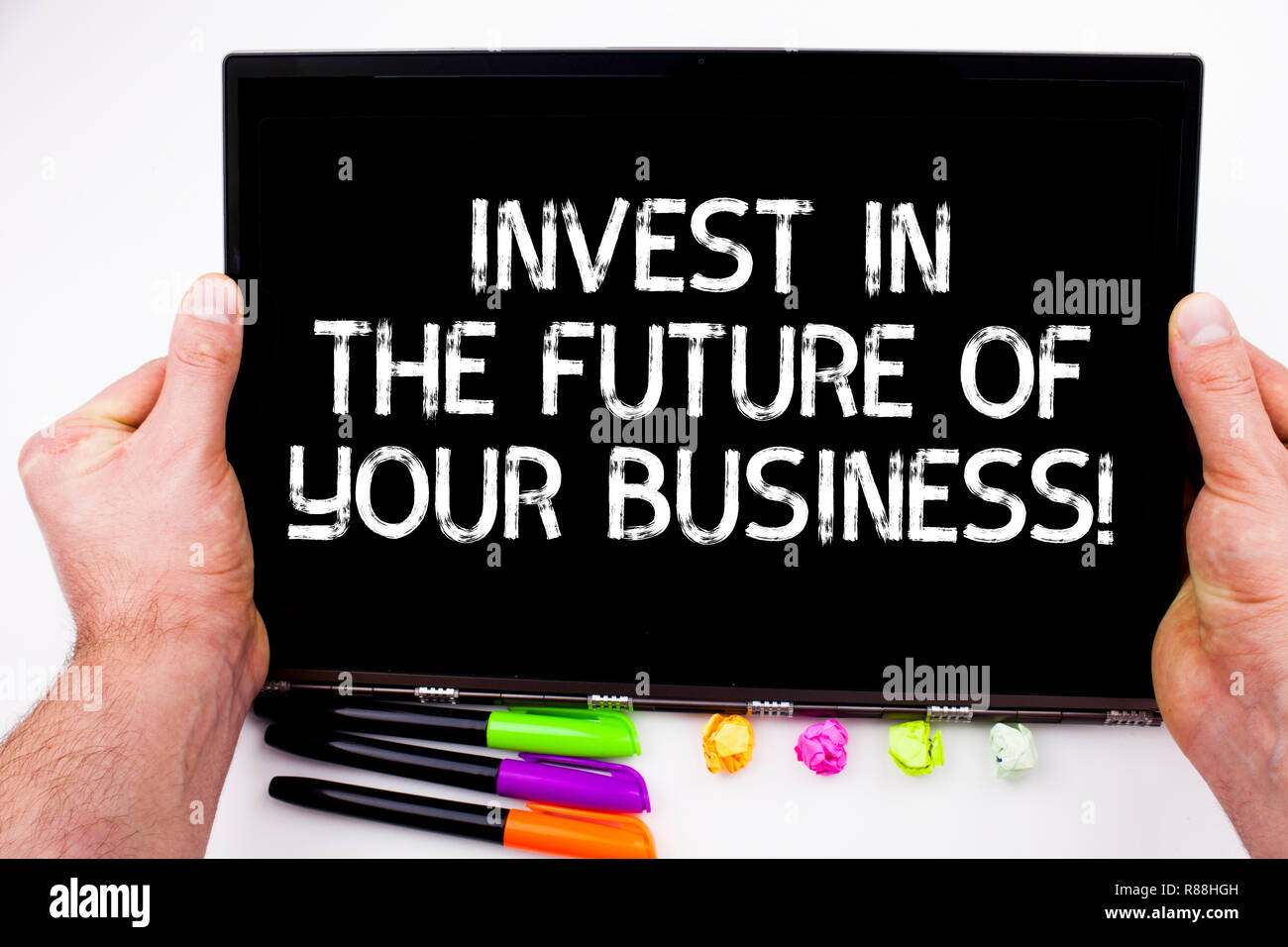 Handwriting text writing Invest In The Future Of Your Business. Concept ...
