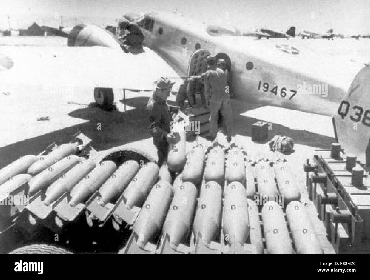 Carlsbad Army Airfield - Loading Concrete Practice Bombs on AT-11 Stock ...