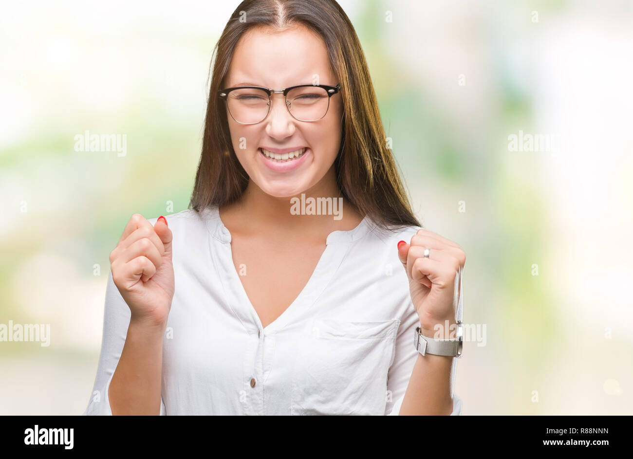 Young caucasian beautiful business woman wearing glasses over isolated ...