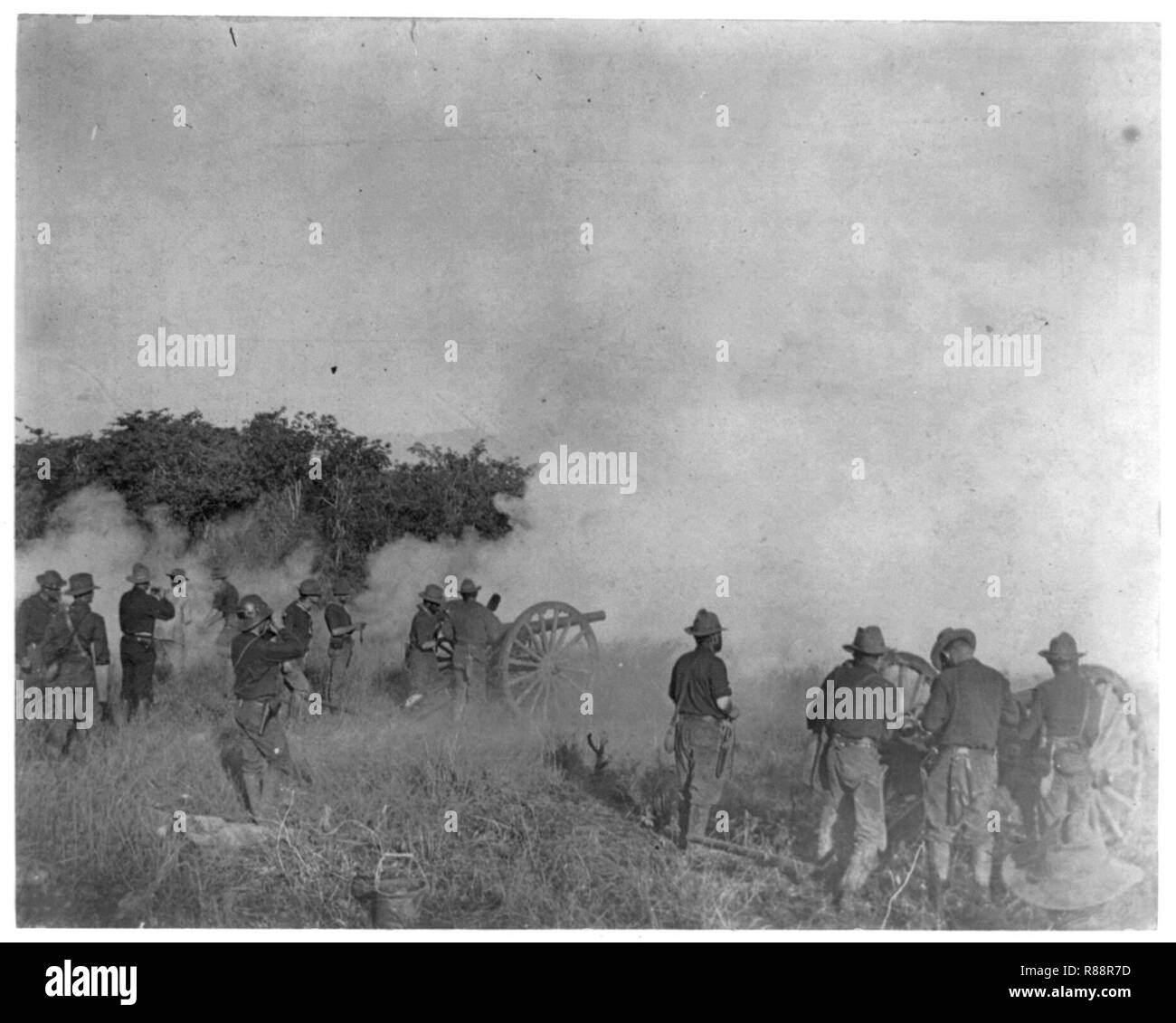 Capron's battery firing on the stone fort at El Caney, Cuba, 1898 Stock ...