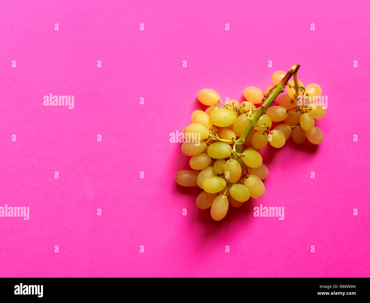 Above view of isolated set of a bunch of sweet seedless grapes in ...
