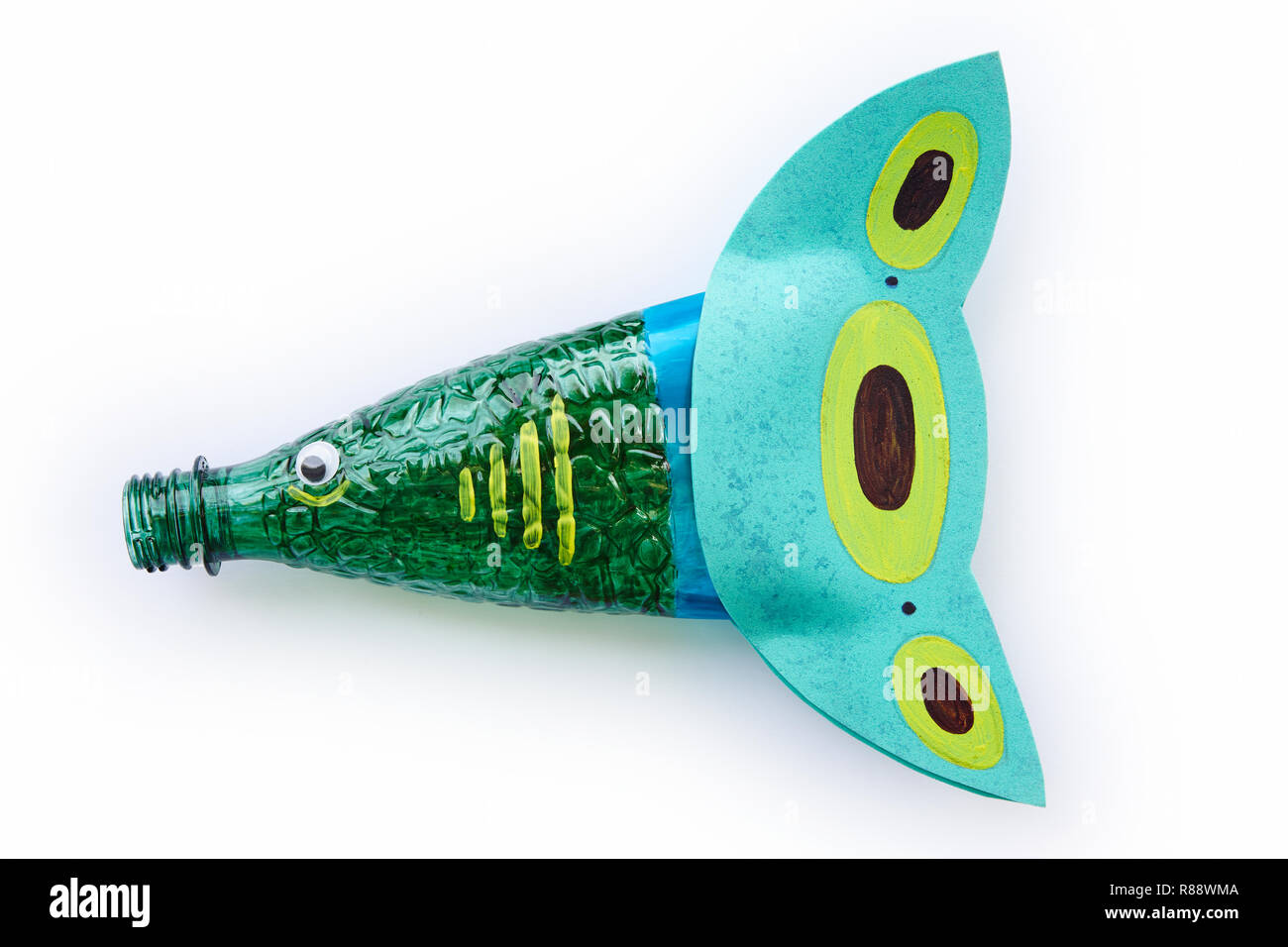 Plastic bottle recycled in a fish figure. Reuse garbage. Isolated Stock ...