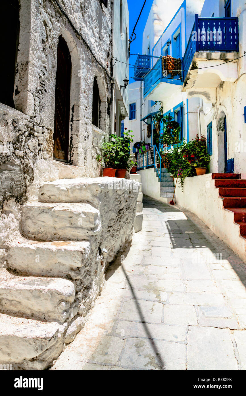 Greek town street with steps in Nisirios town Stock Photo - Alamy