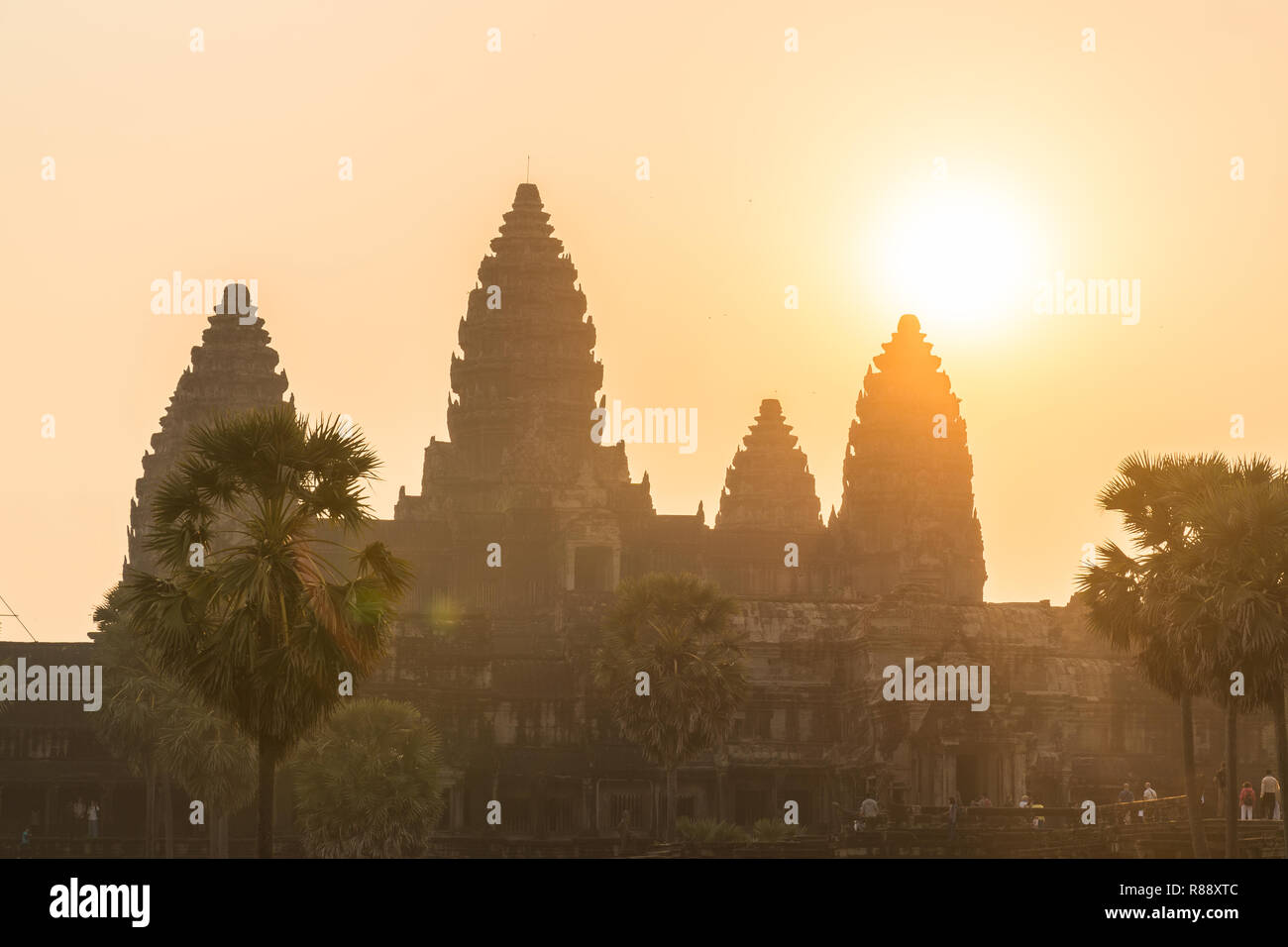 The sun is rising over the temples of Angkor Wat, Cambodia Stock Photo ...