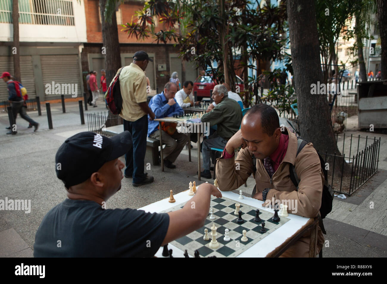 Men playing chess games face to face in city square,Caracas, Venezuela ...