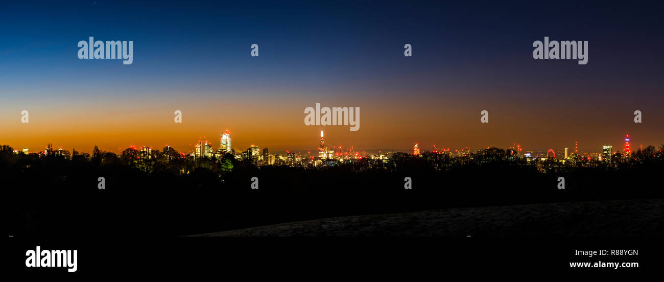 Panoramic view of dawn over the London skyline from Hampstead Heath ...