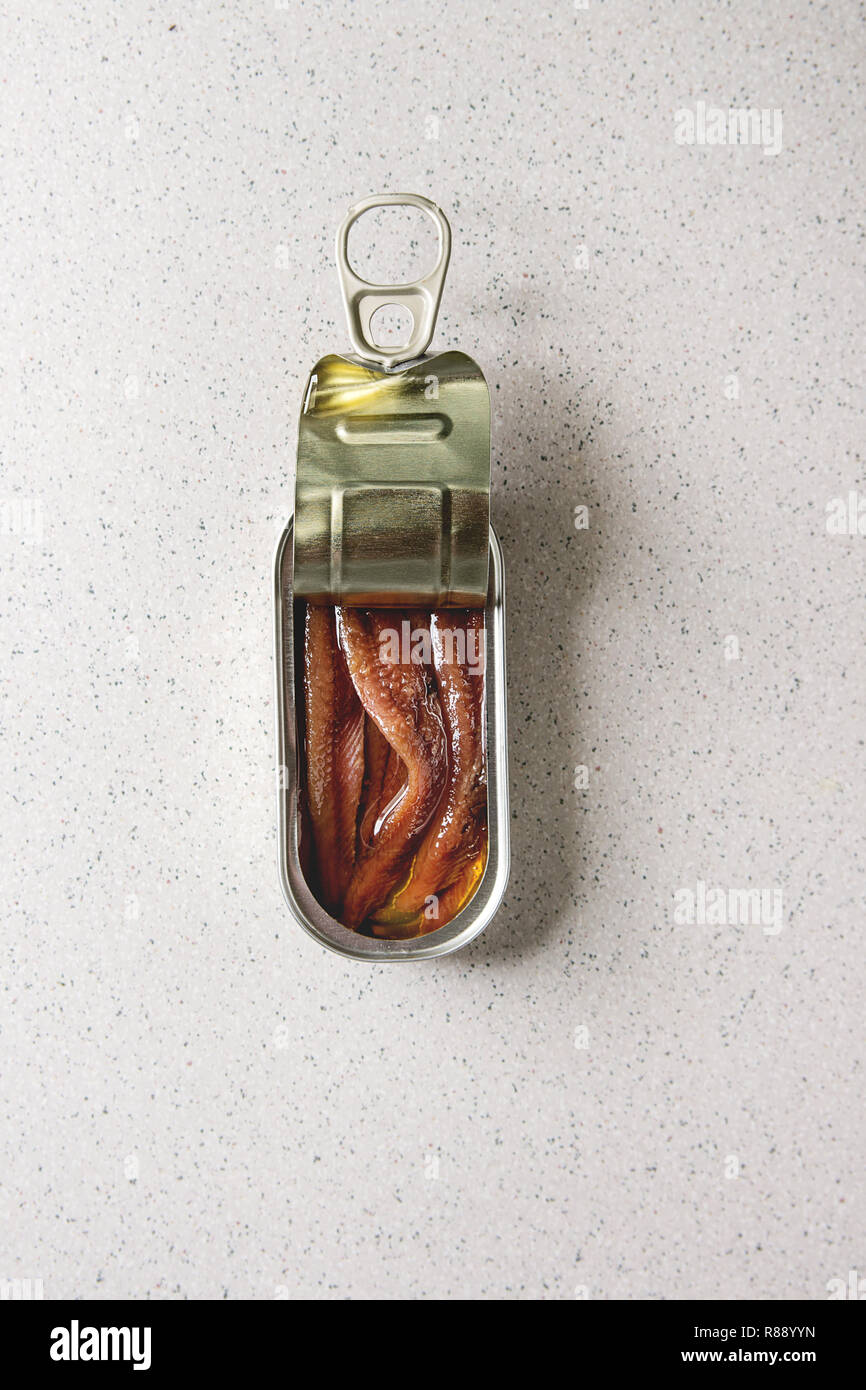 Pickled anchovies in tin can Stock Photo - Alamy