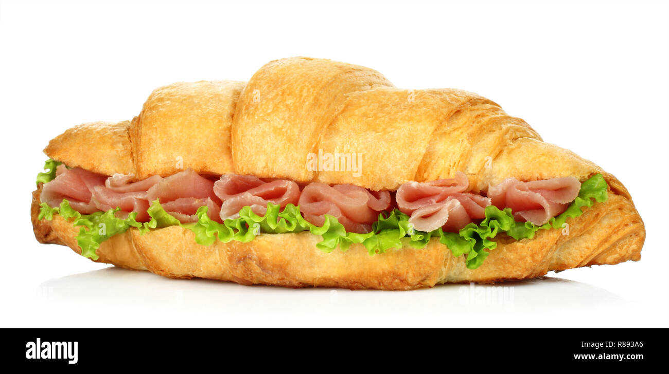 Big croissant with green salad and pork meat on white background Stock ...