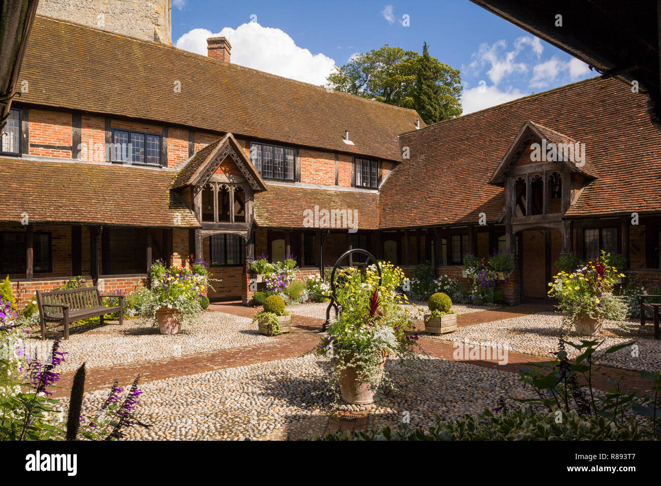 The courtyard of the historic almshouses in the village of Ewelme ...