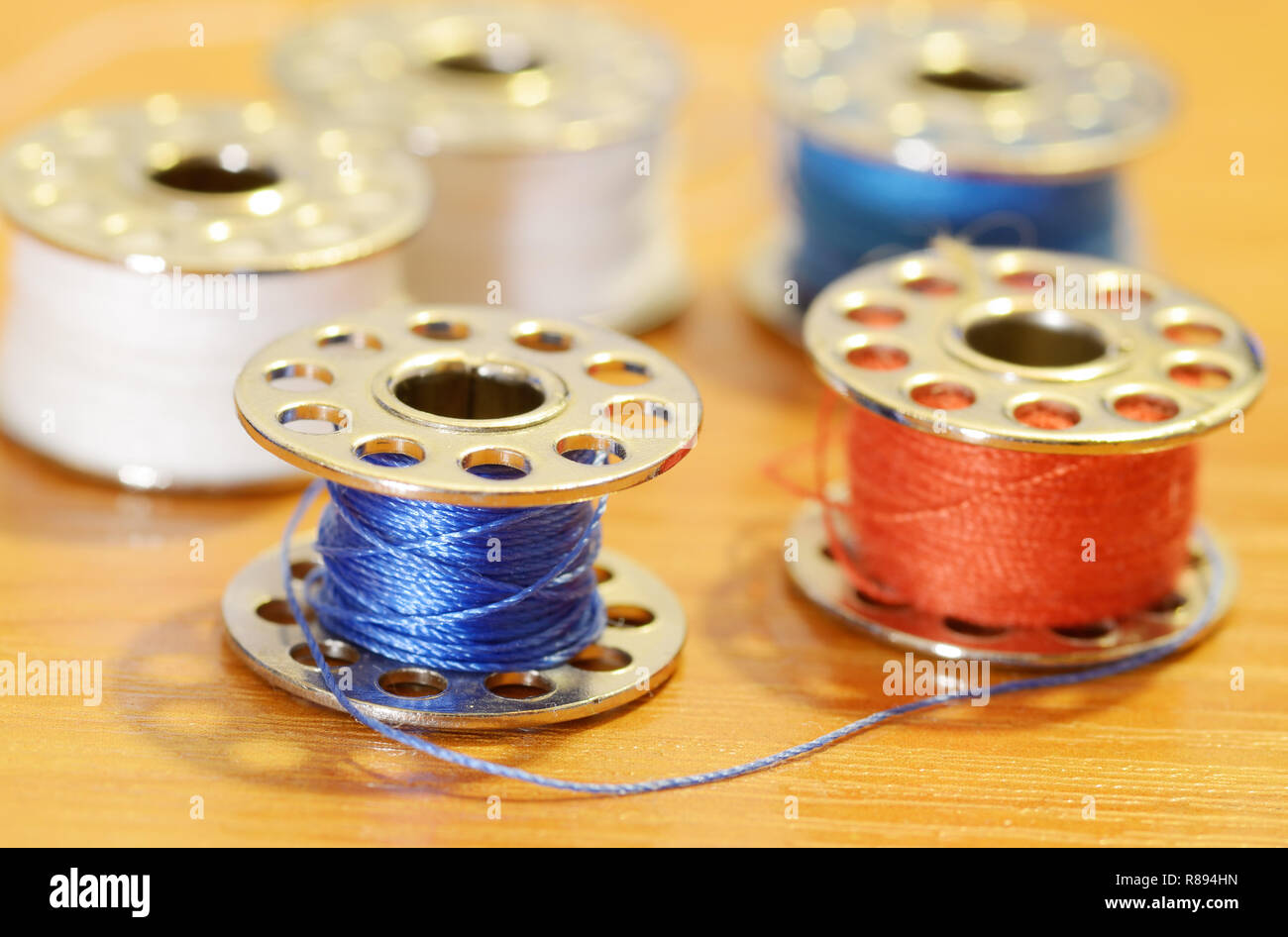 Coil with a sewing thread.Use for sewing clothes Stock Photo - Alamy
