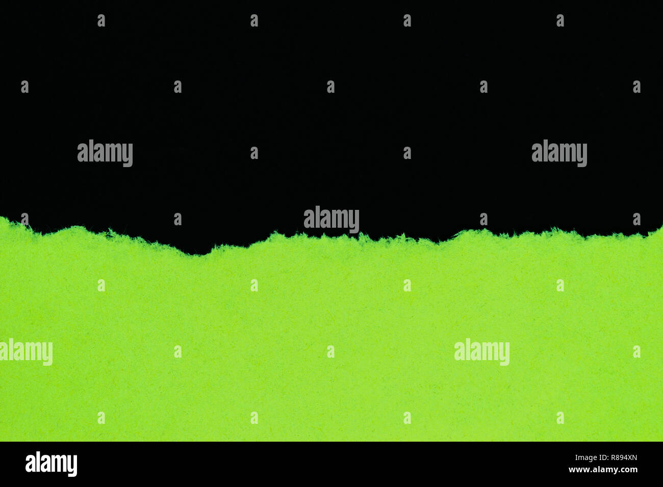 Green ripped paper isolated on black background with copy space Stock ...