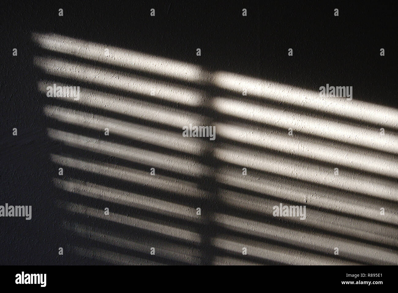 Shadow from venetian blinds hi-res stock photography and images - Alamy
