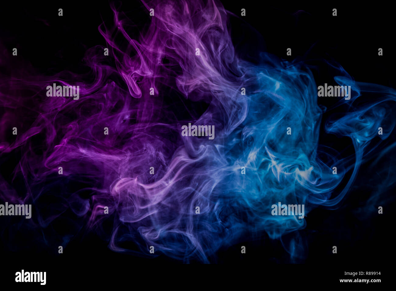 Colorful pink and blue smoke on a black isolated background. Background ...