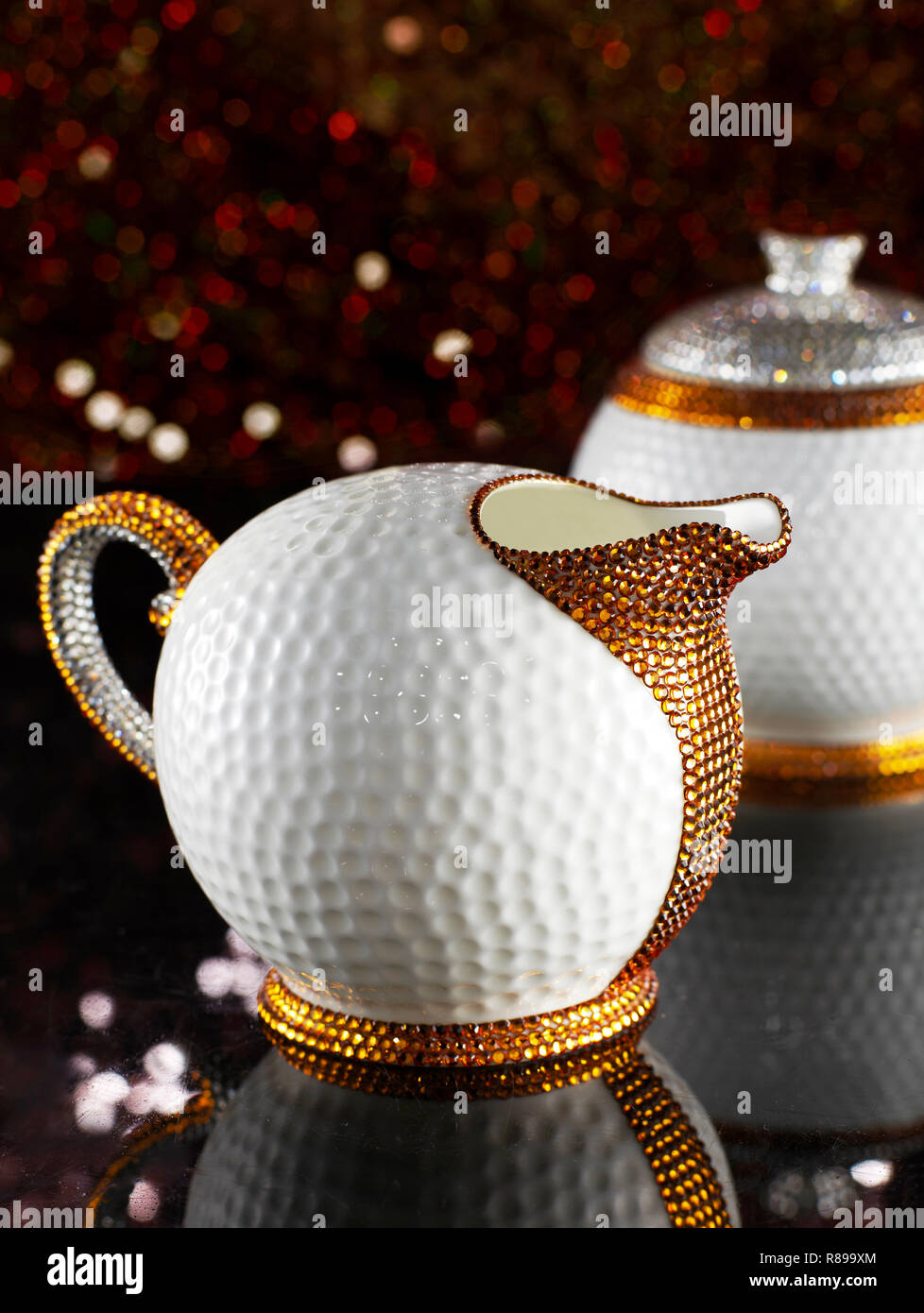 Fine tableware combination on dark background Stock Photo - Alamy