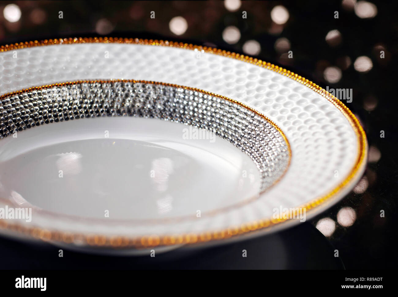 Fine tableware combination on dark background Stock Photo - Alamy