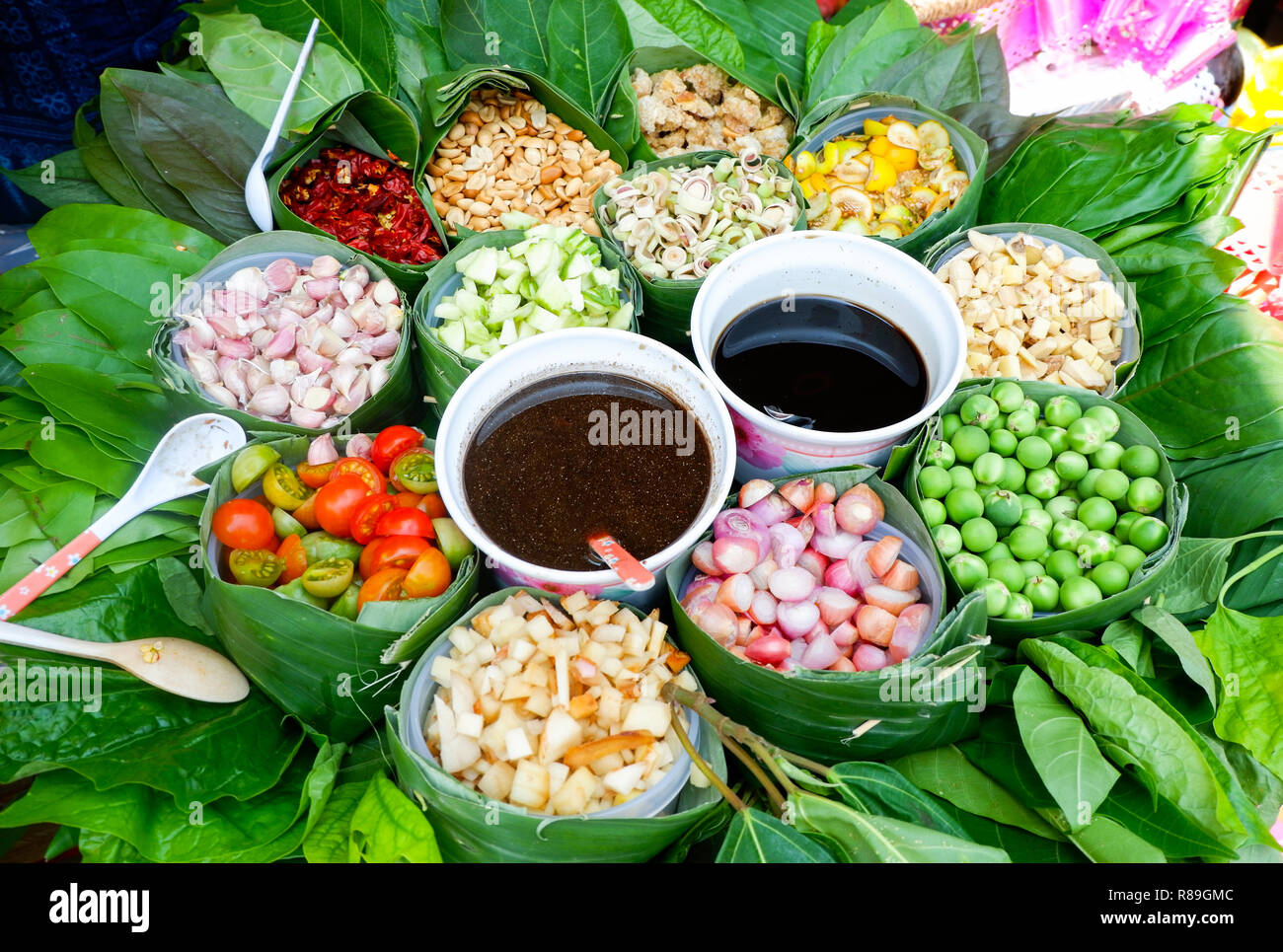 food wrapped in leaves / healthy food with leaf vegetable and herbs ...
