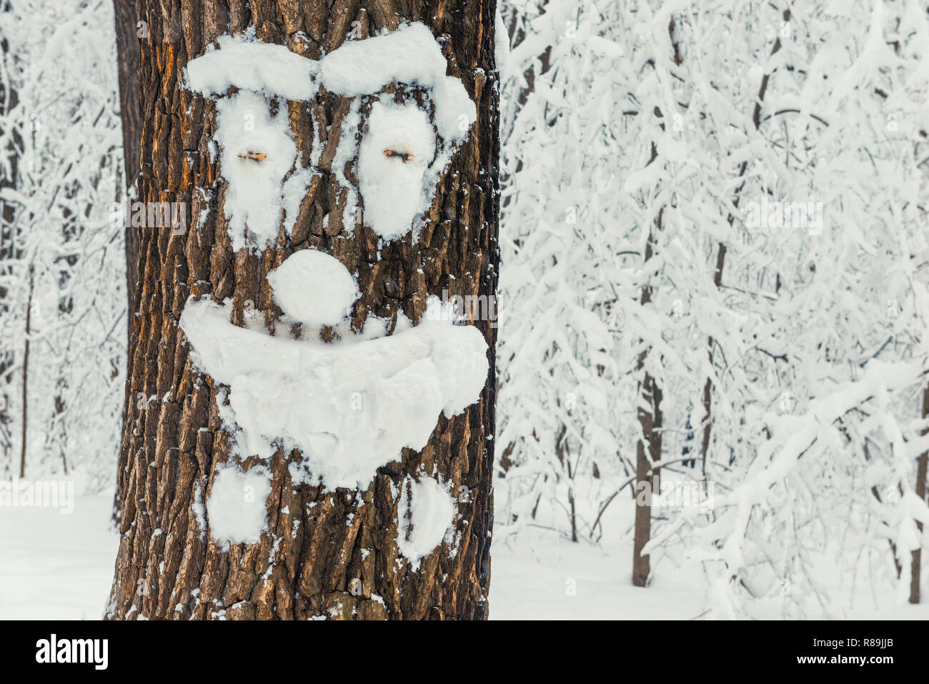 Smiley on tree hi-res stock photography and images - Alamy
