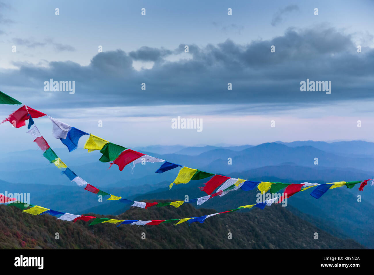Prayer flags blowing in the wind in Annapurna Himal, Nepal, Himalayas ...