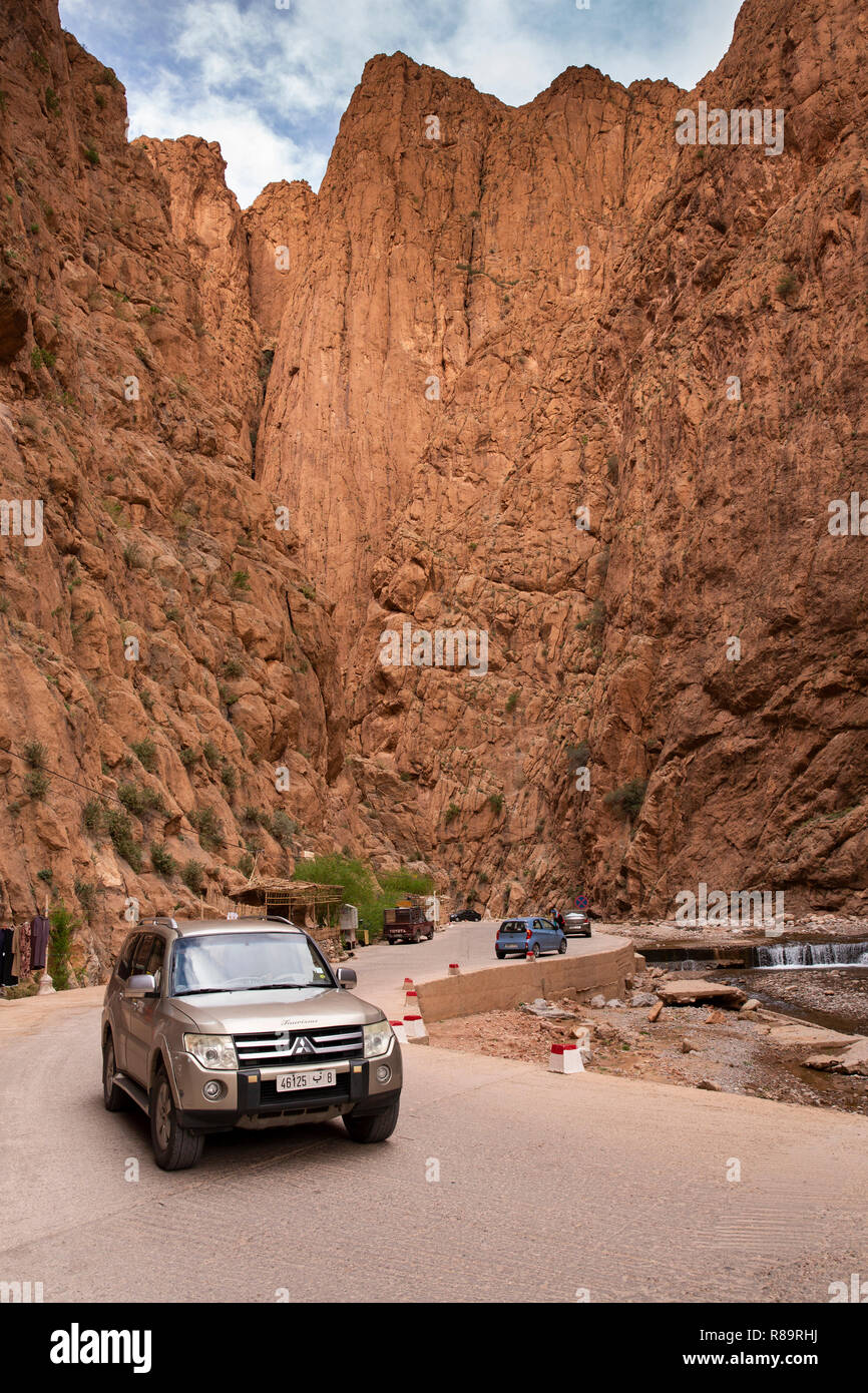 Morocco, Todra Gorge, tourist cars on road through deep gorge Stock ...
