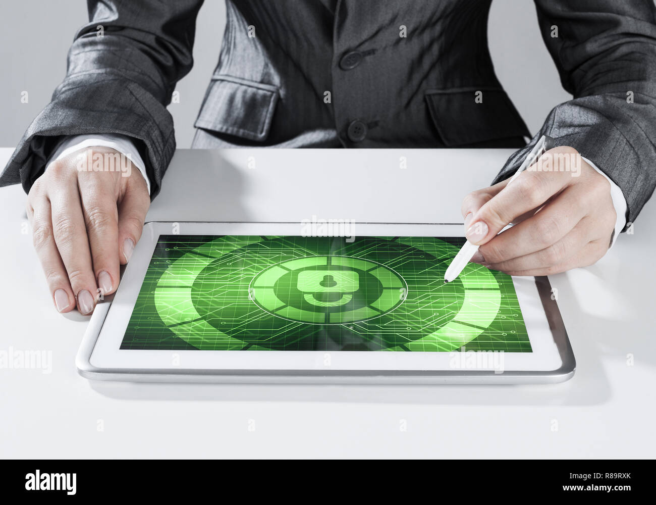 Internet security concept with woman working on media screen wit Stock ...