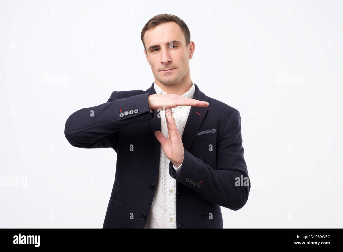 Time break hand symbol hi-res stock photography and images - Alamy