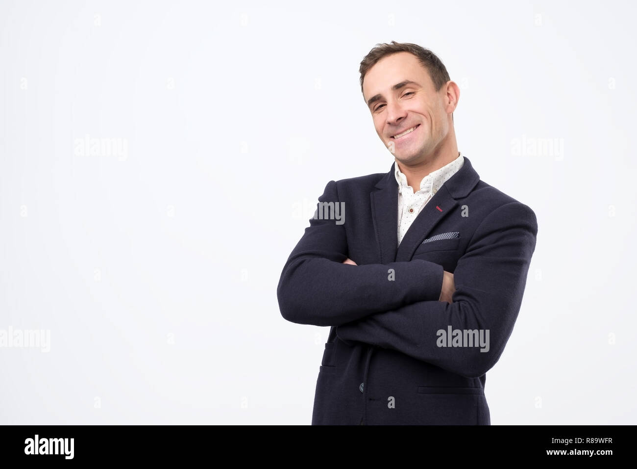 heerful guy laughing and looking at camera with a big grin Stock Photo ...