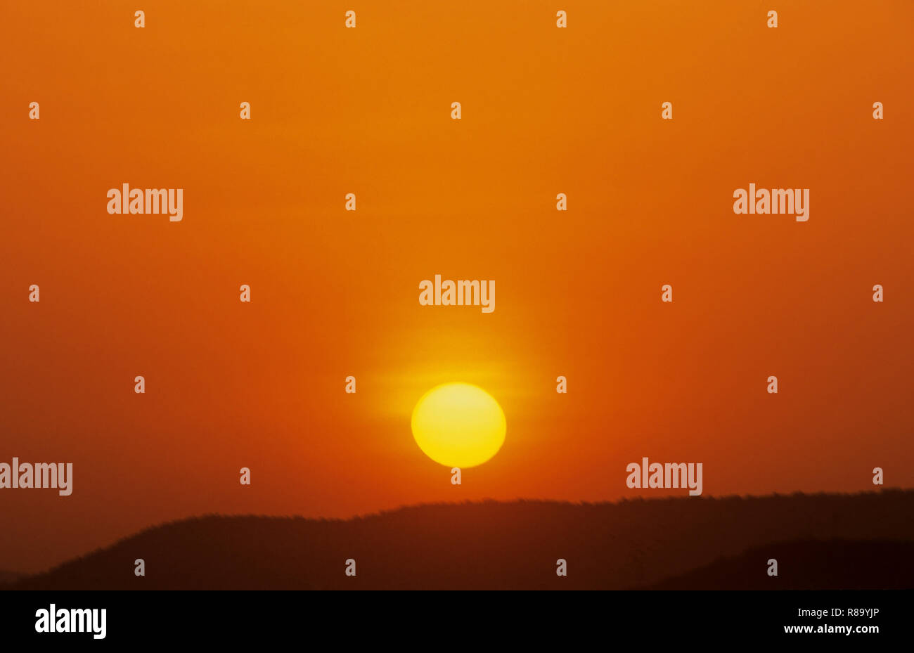 colourful sunset behind mountain, pune, maharashtra, india Stock Photo ...