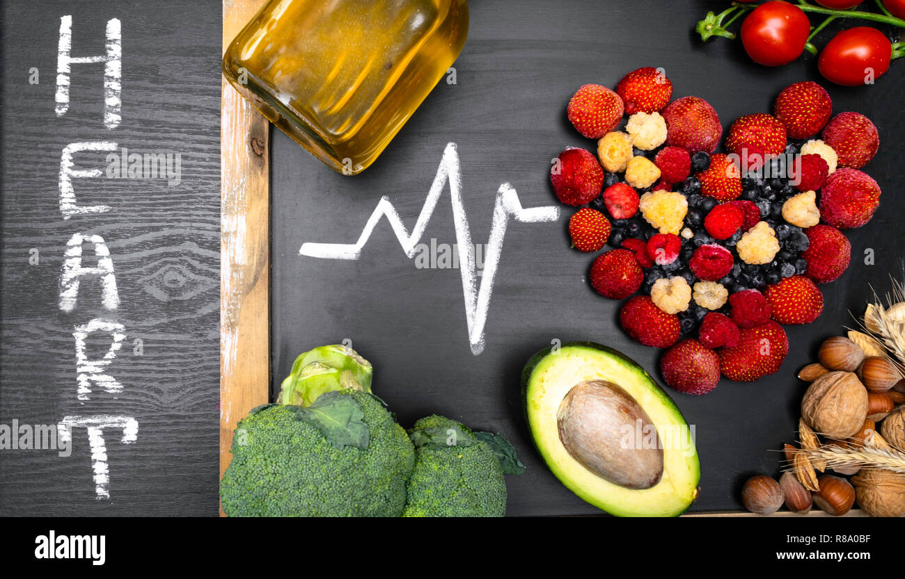 Healthy eating and heart health concept with a heart shaped with ...