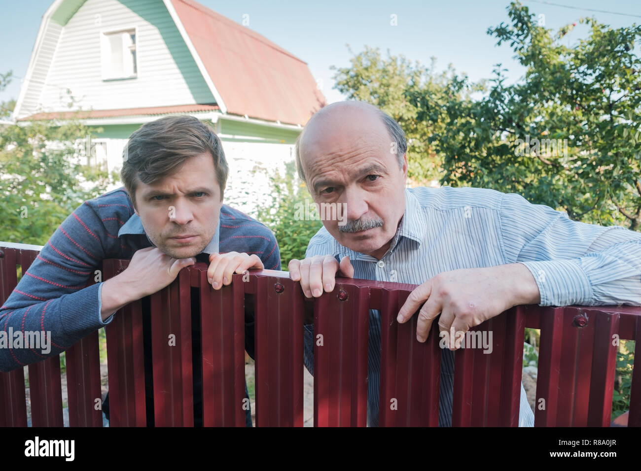 Peeping neighbour curious neighbor hi-res stock photography and images ...
