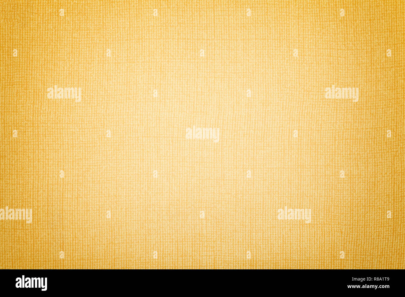 Light yellow background from a textile material with wicker pattern ...