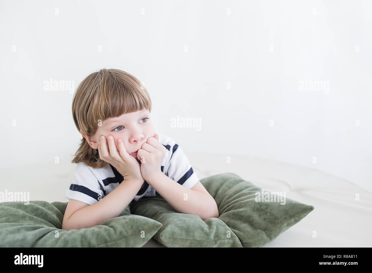 Boy lying bed thinking hi-res stock photography and images - Alamy