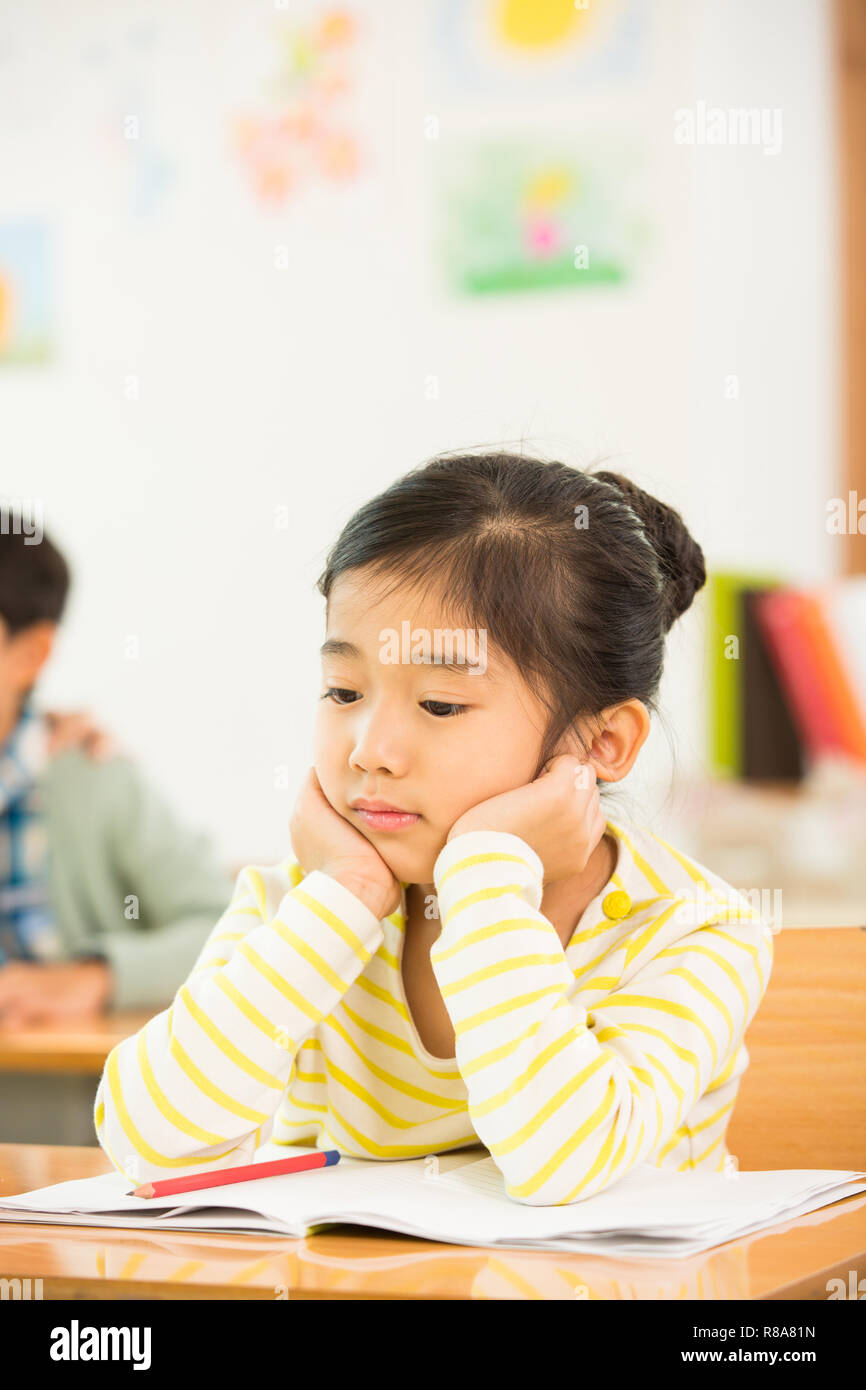 Young Student Looking Lost In Class Stock Photo - Alamy