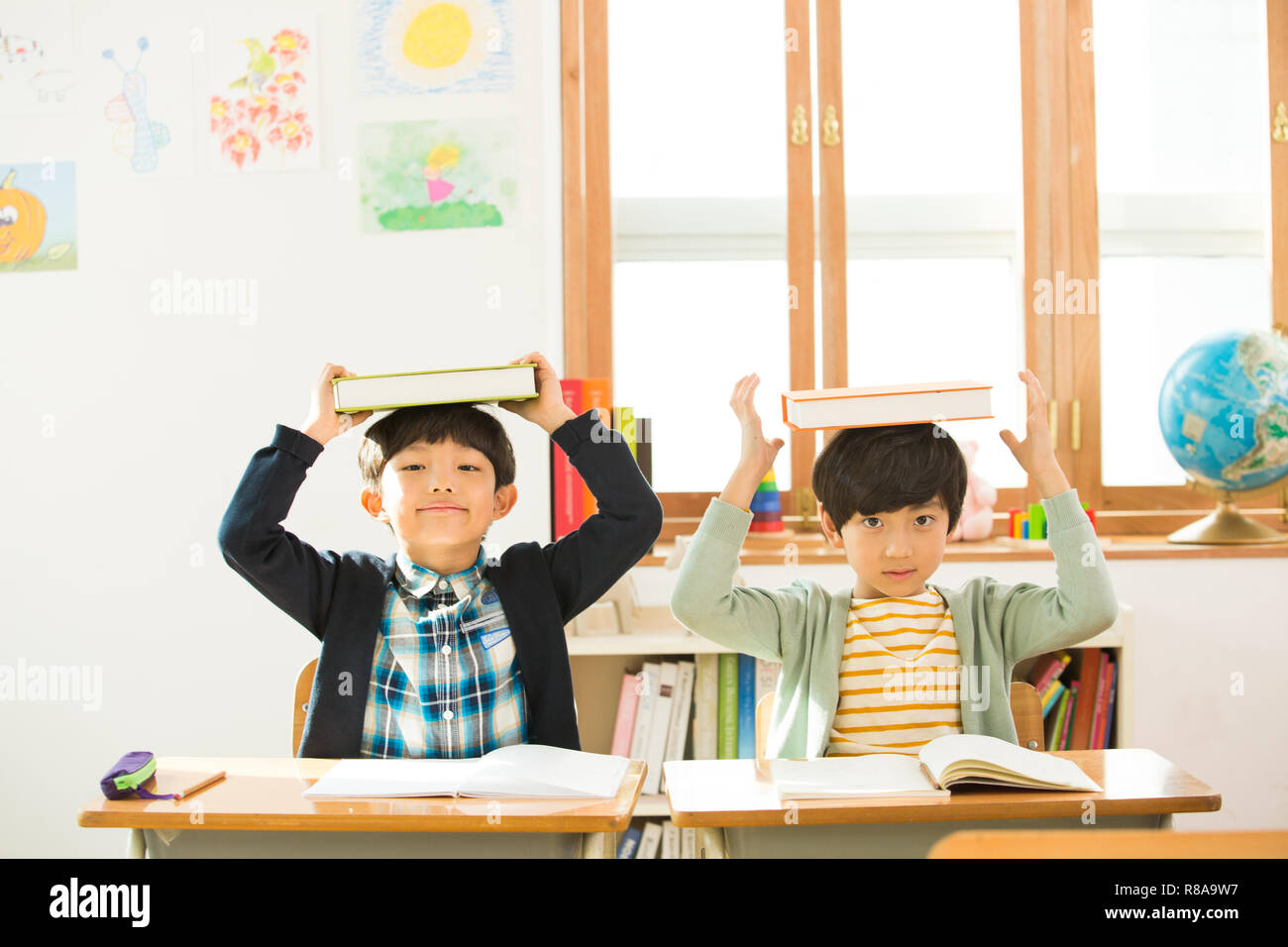 Two Young Male Students In Class Stock Photo - Alamy